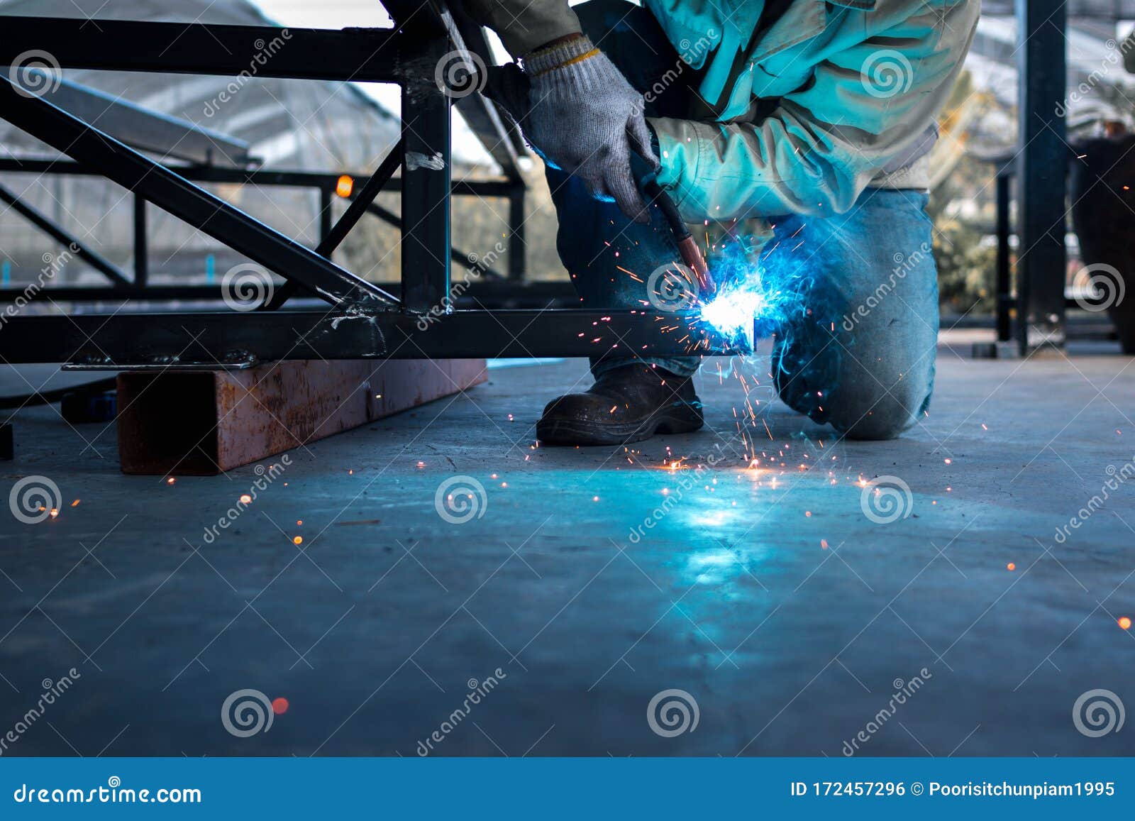 A Man Welder in Uniform is Working Stock Photo - Image of protection ...