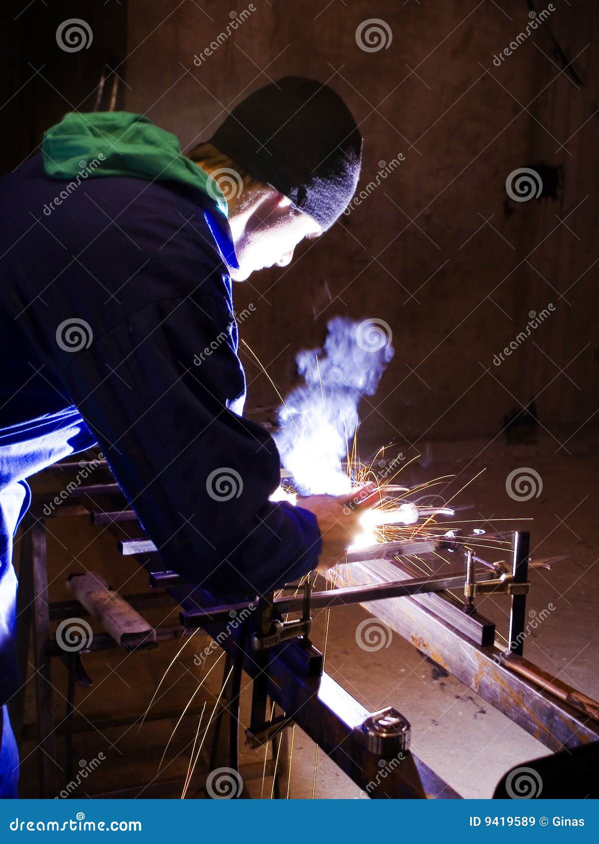 Man welding stock image. Image of glow, grinding, hood - 9419589