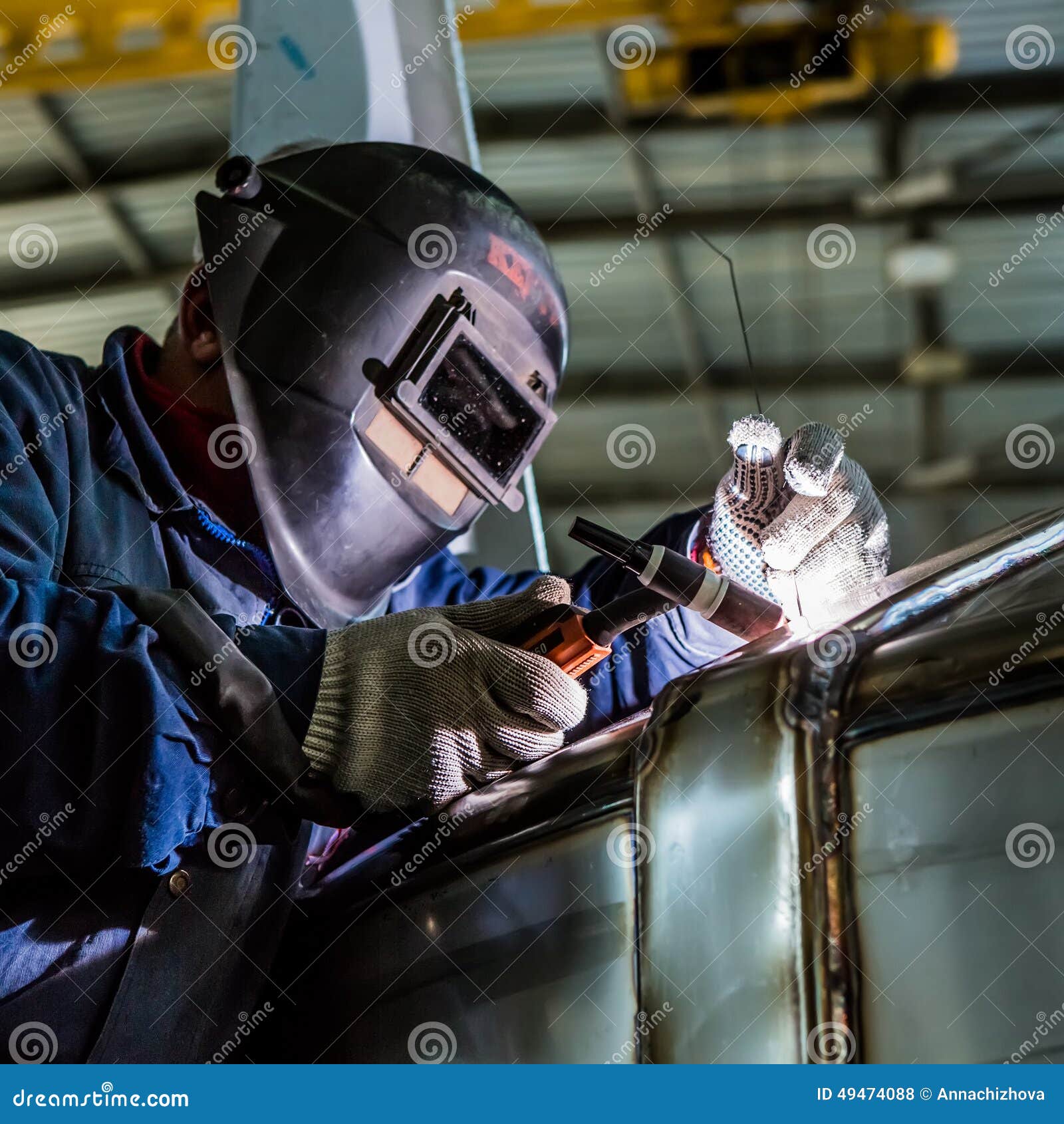 Man Welding with Reflection of Sparks on Visor Stock Photo - Image of ...