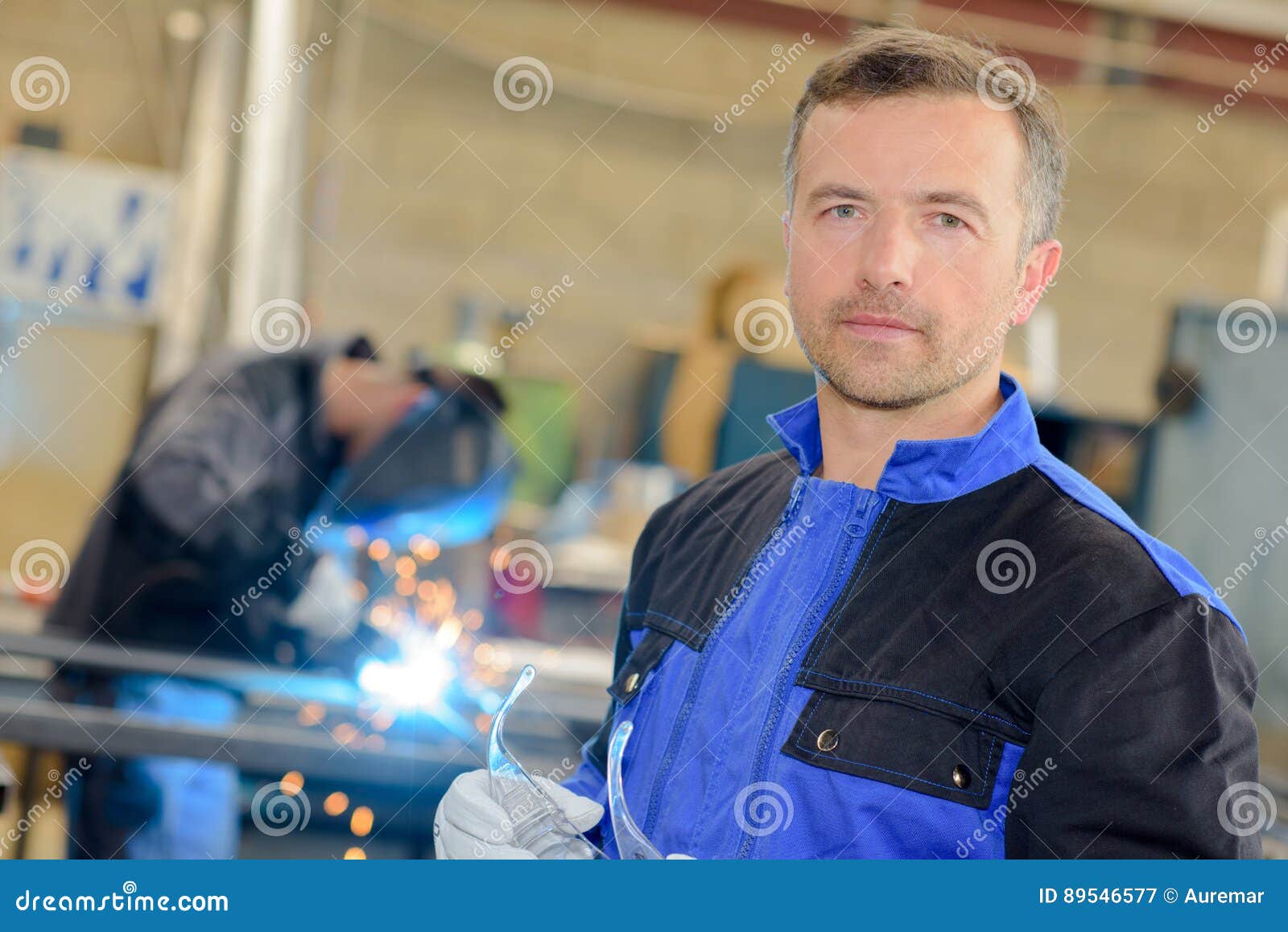 Man in welding shop stock image. Image of handsome, welding - 89546577