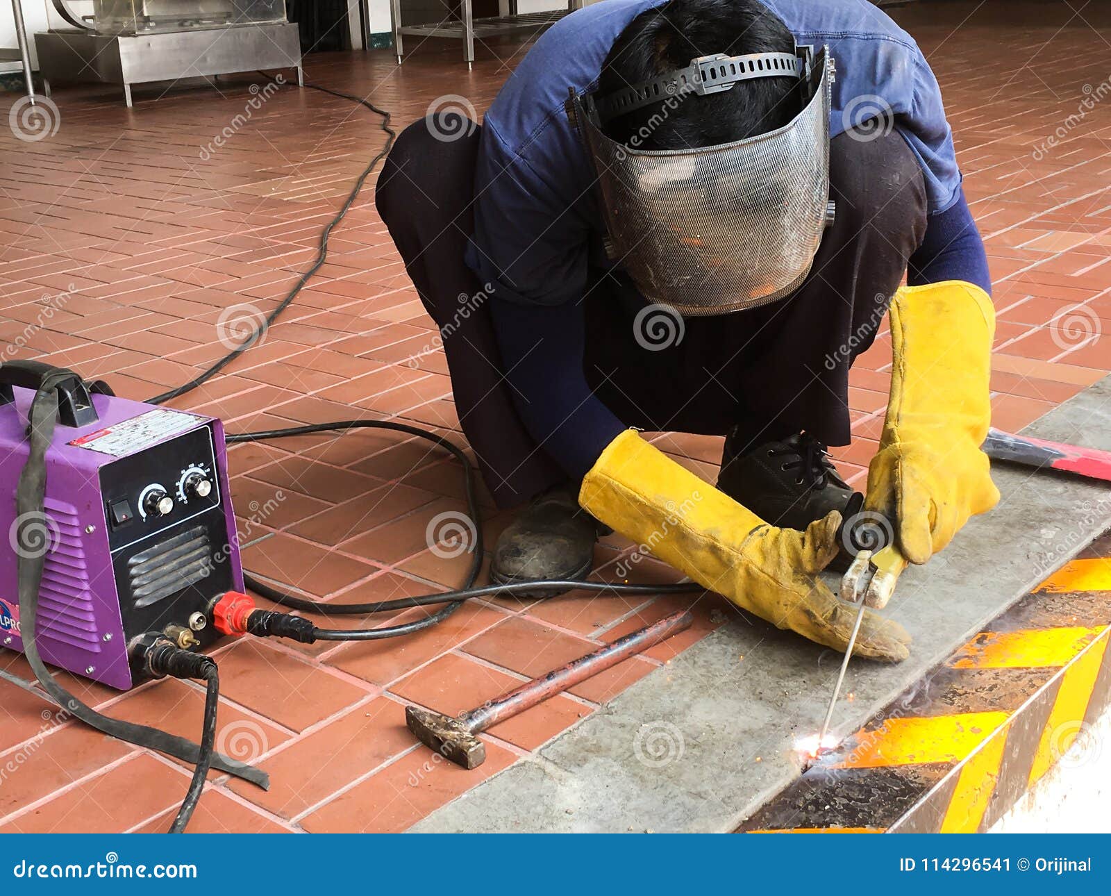 A Man Welds A Metal With A Welding Job Stock Image Image Of Steel