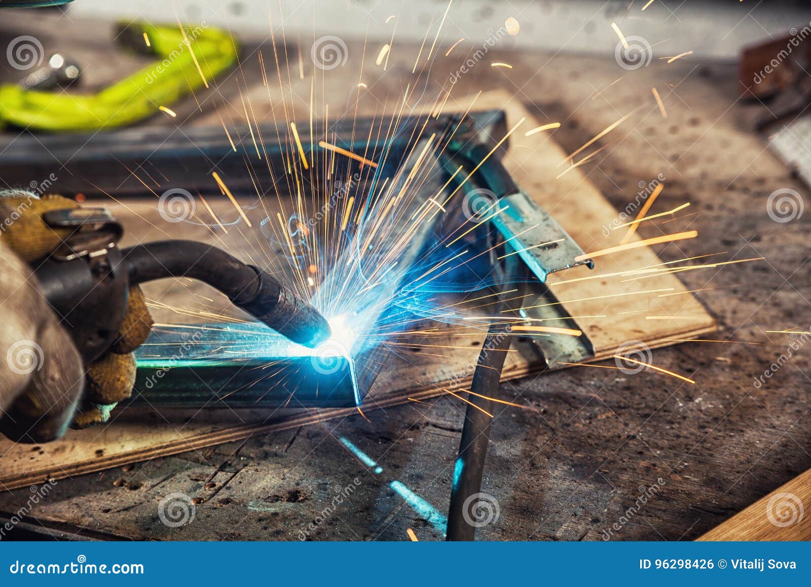 Man Welds a Metal Welding Machine Stock Photo - Image of person ...