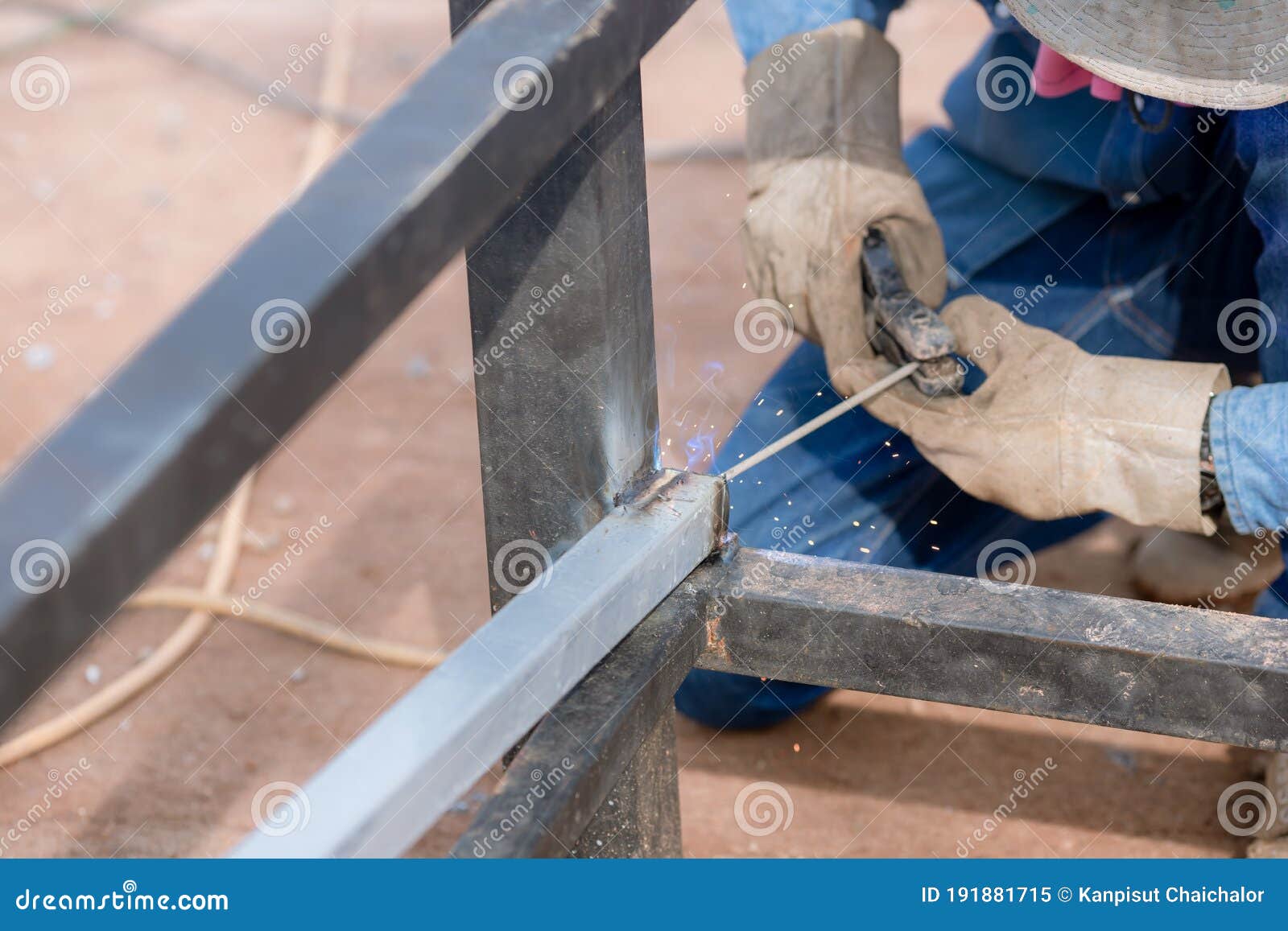 Man Welds A Metal With A Welding Machine Profession Of Welder Arc