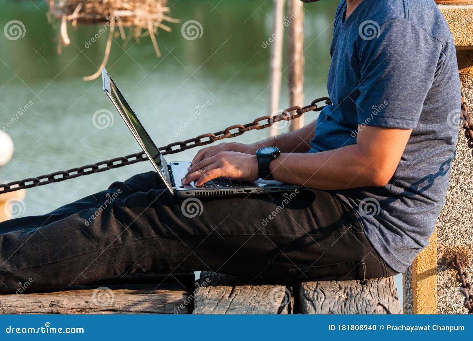 Man Who Working Remotely by Using Laptop Computer in the Park. Stock ...