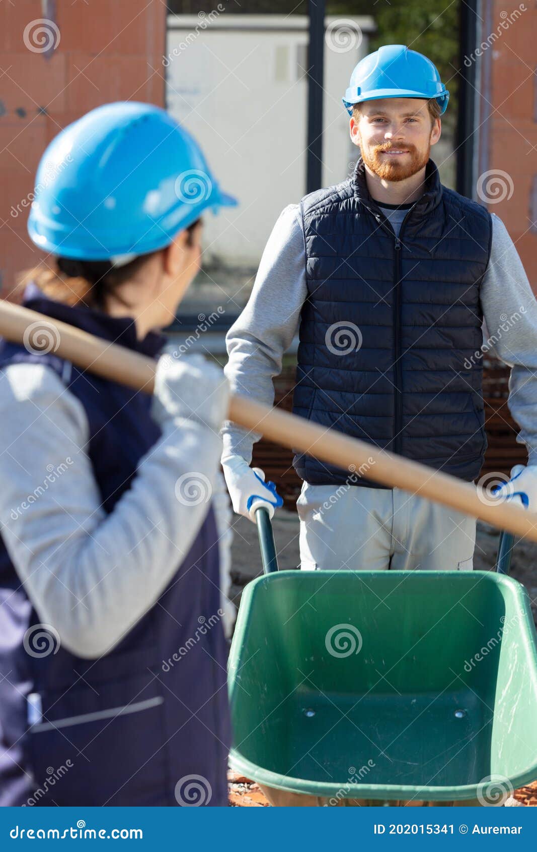 Man with Wheelbarrow at Construction Site Stock Image - Image of person ...