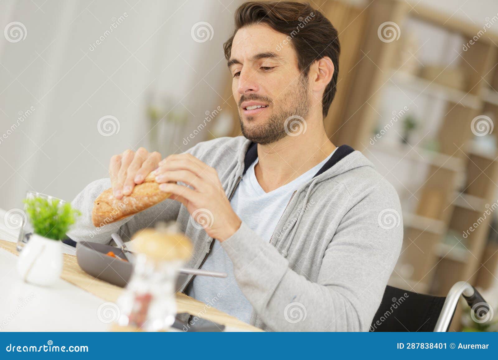 Man Breaking The Bread, With Wine, Grapes And Bible In The Background ...