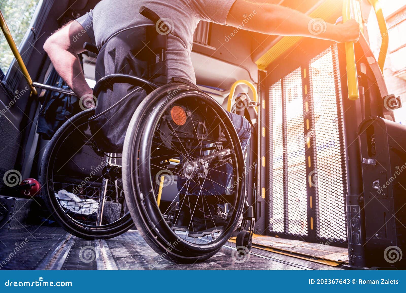 A Man in a Wheelchair Inside of a Specialized Vehicle Stock Image ...