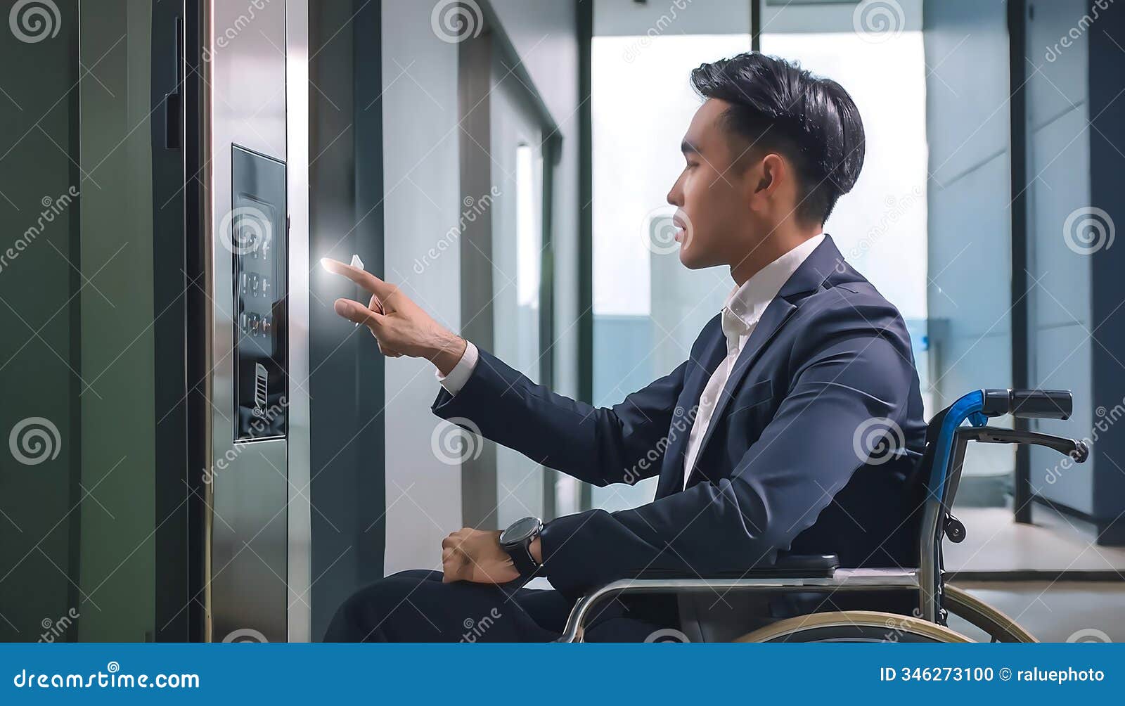 A Man in a Wheelchair Presses a Button on an Elevator Control Panel in ...