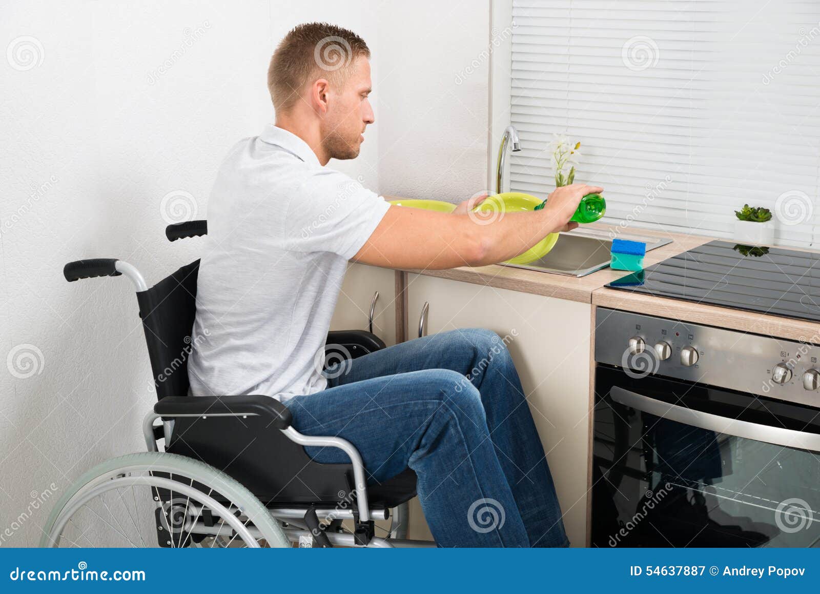 Man on Wheelchair Washing Dishes Stock Image - Image of disability ...