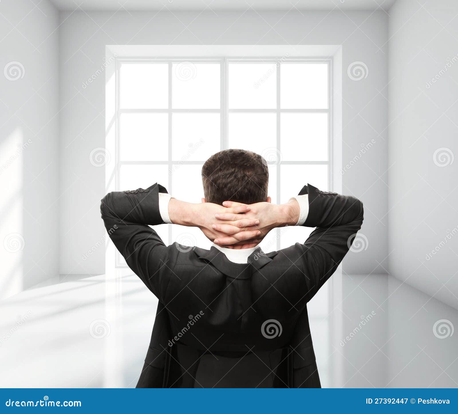 Man in white room stock image. Image of indoors, back - 27392447