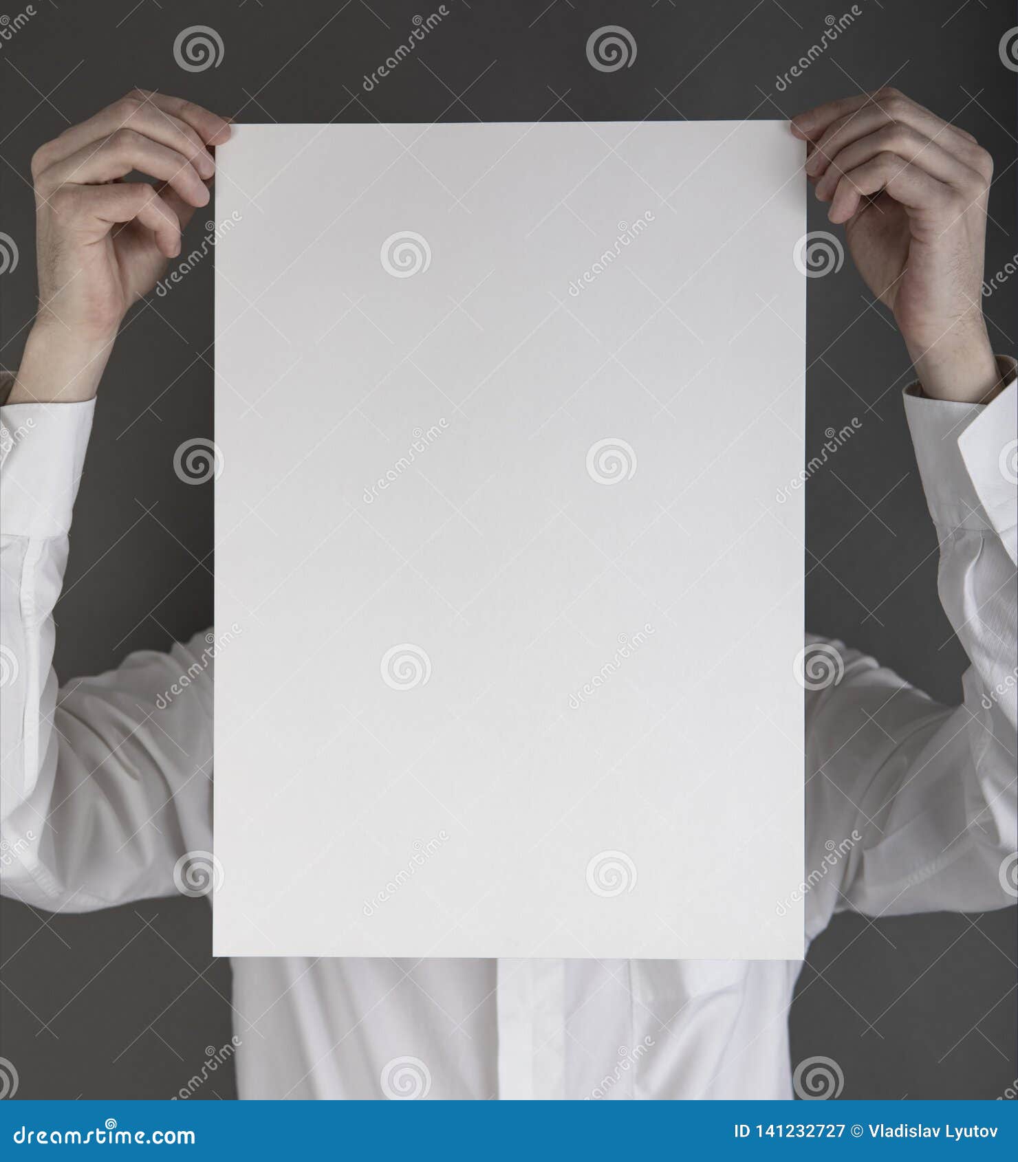 A man holding white poster stock image. Image of diary - 141232727
