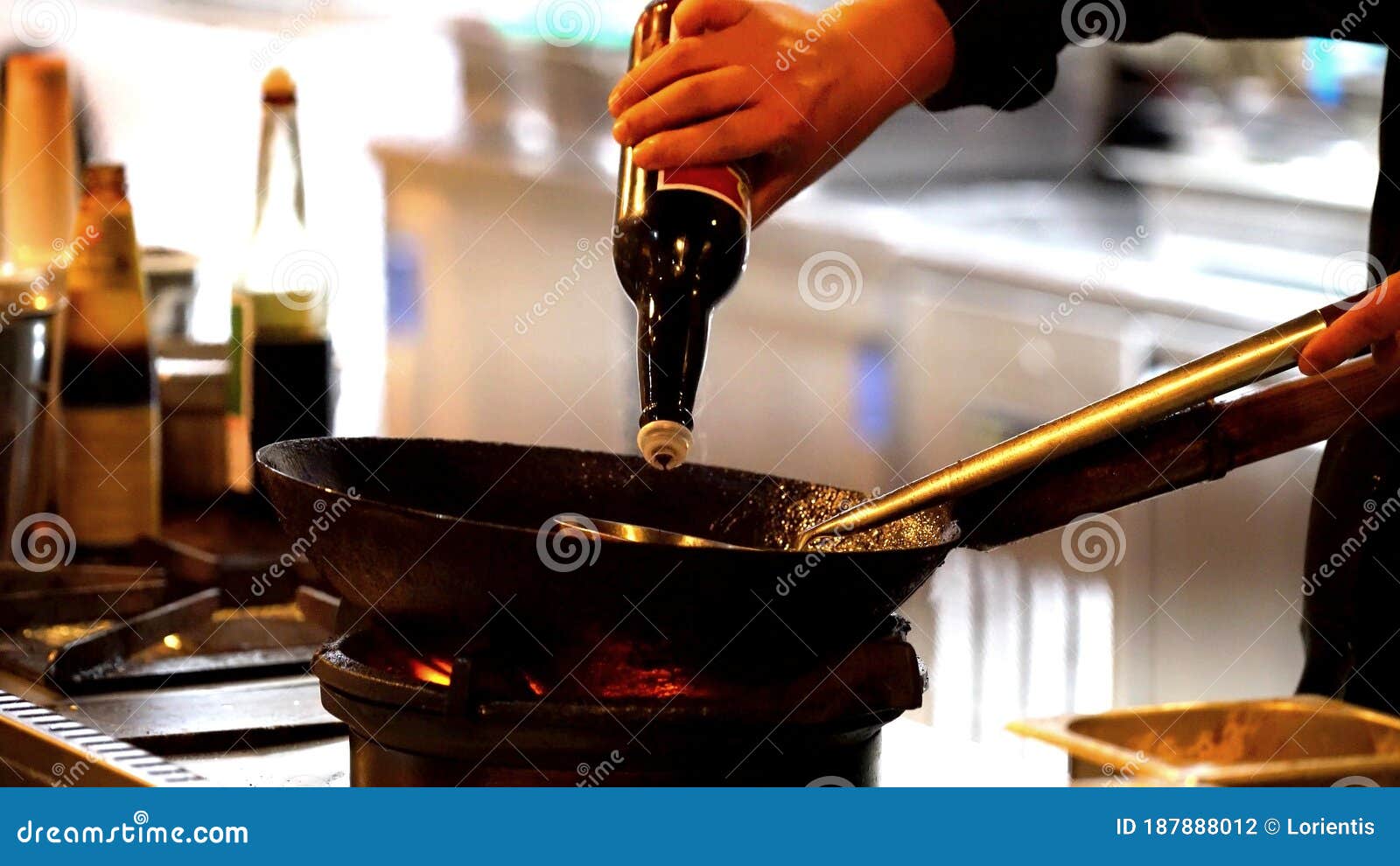 A Man Who is Cooking in a Wok Stock Photo - Image of meat, fresh: 187888012