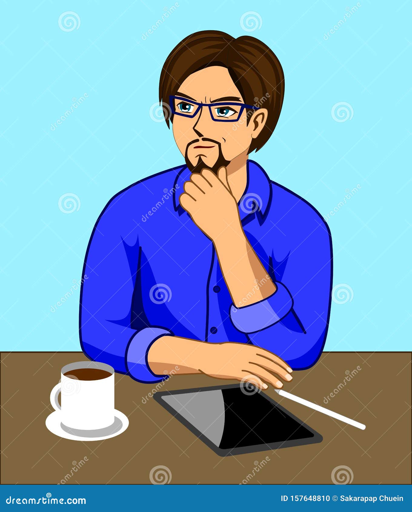 A Man Who is Thinking while Working at a Desk with a Tablet and a ...