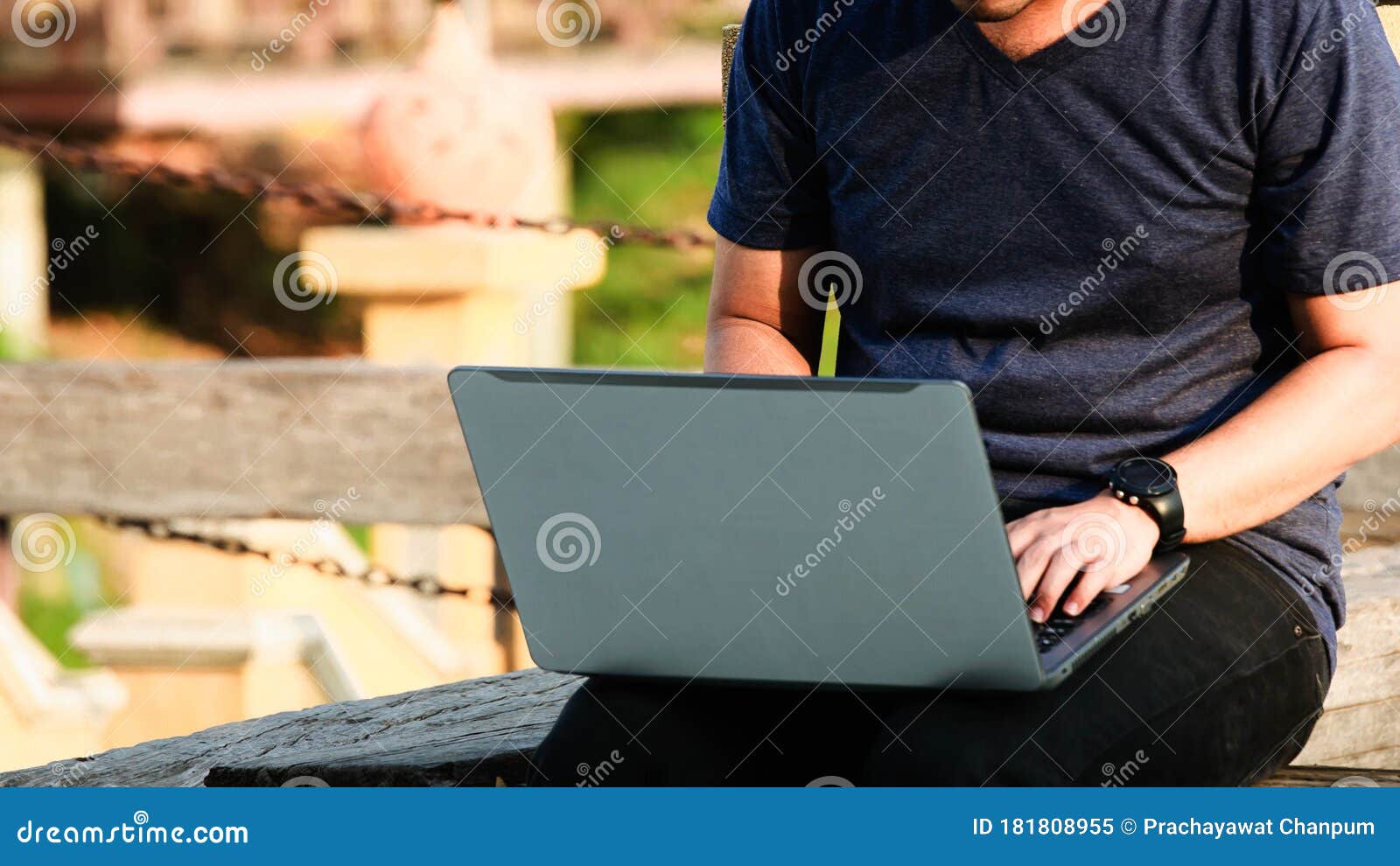 Man Who Working Remotely by Using Laptop Computer in the Park. Stock ...
