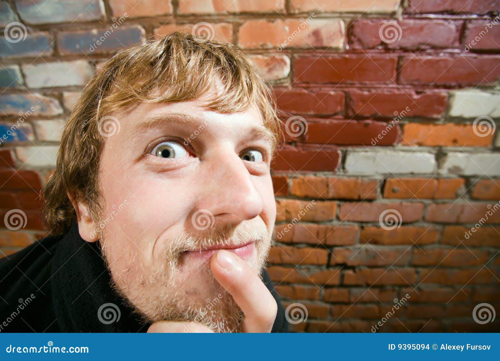Man with wide-open eyes stock photo. Image of smiling - 9395094