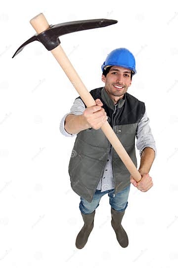 Man wielding pick-axe stock image. Image of labor, dirty - 27192985