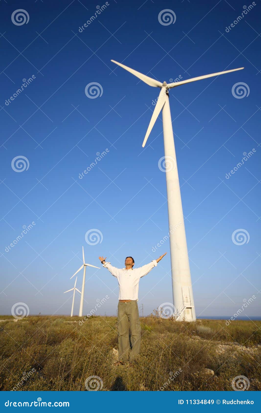 Man and wind turbines stock image. Image of turbine, supply - 11334849
