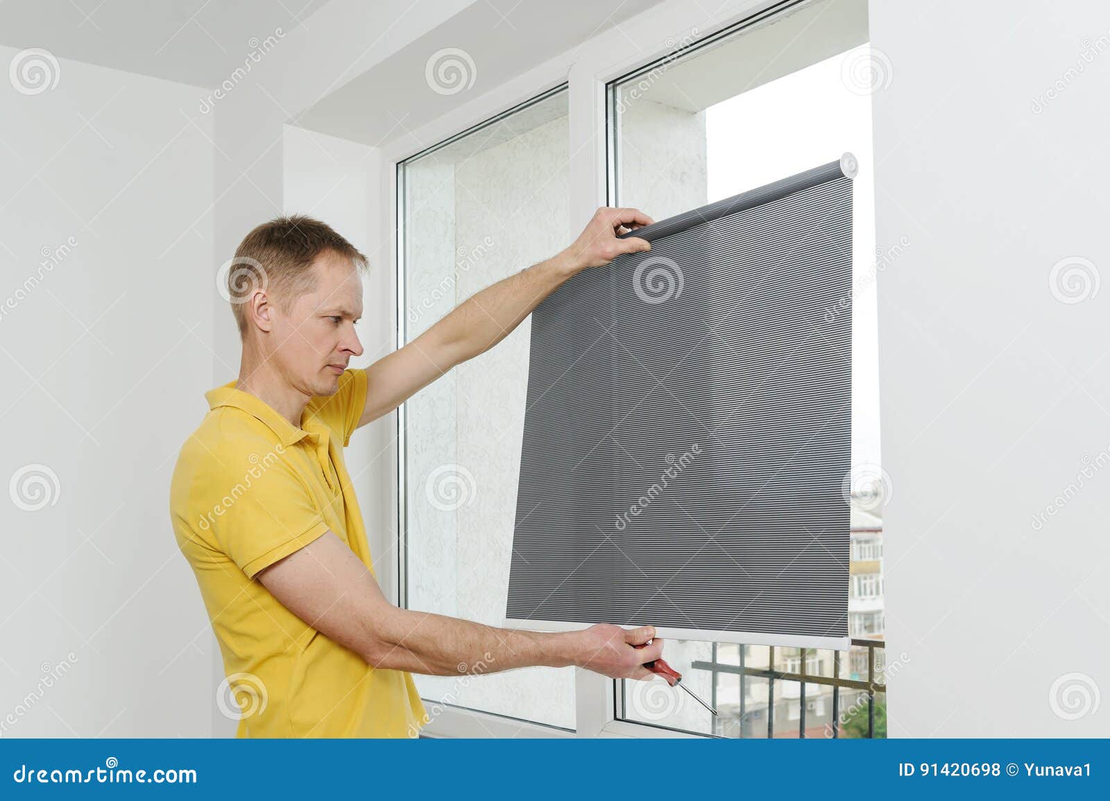 Man with window blind. stock photo. Image of shadow, design - 91420698