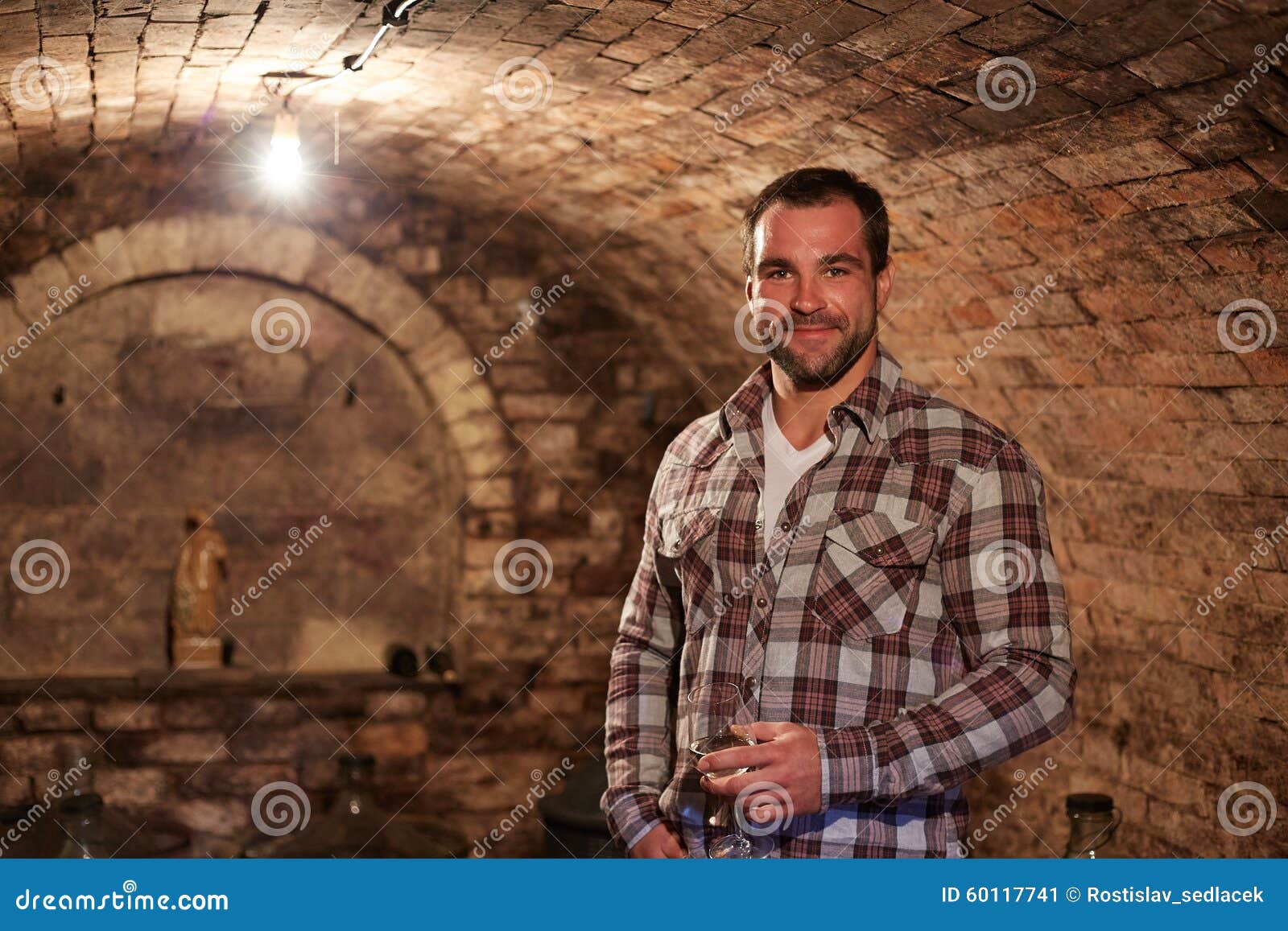 Man in wine cellar stock image. Image of smelling, alcohol - 60117741