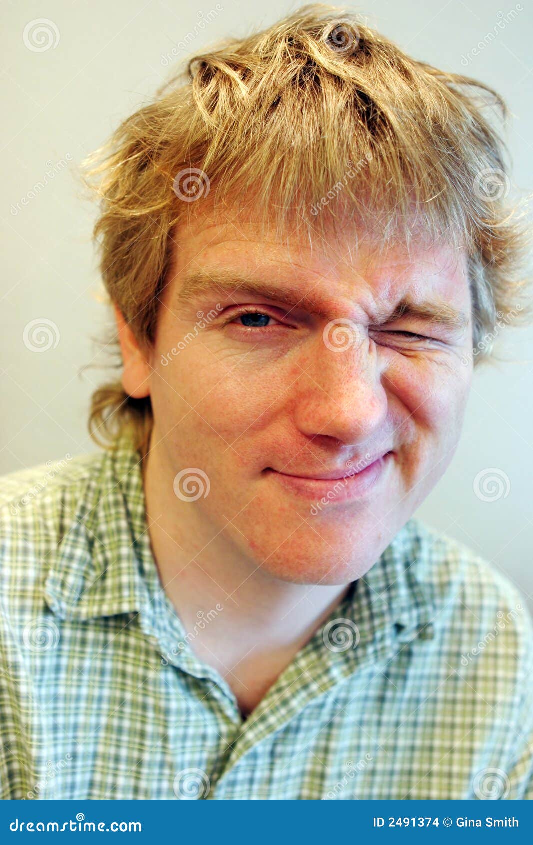 Man winking stock photo. Image of smile, comical, wink - 2491374