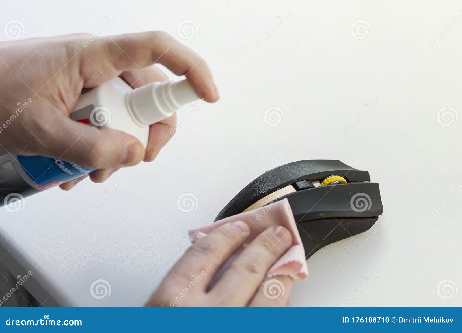 Man Wipes a Dirty Mouse with a Rag . Cleaning the Computer Mouse Stock ...