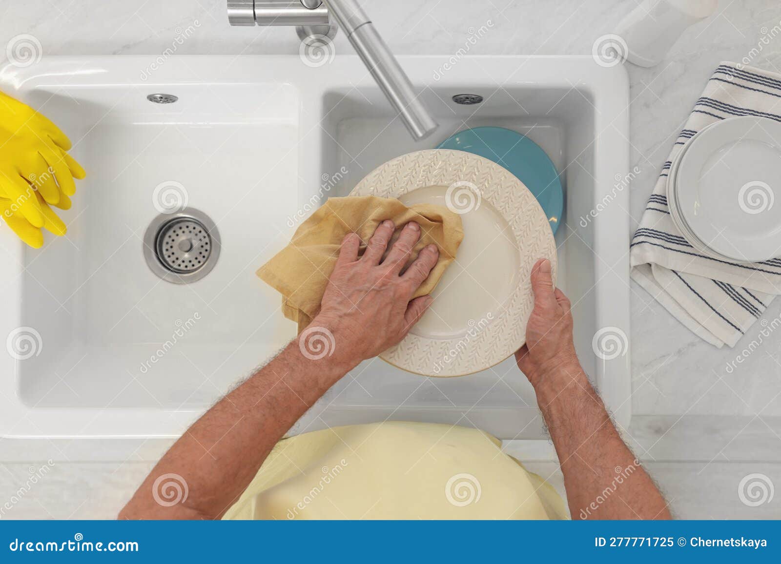 Man Wiping Plate Above Sink, Top View Stock Image - Image of domestic ...