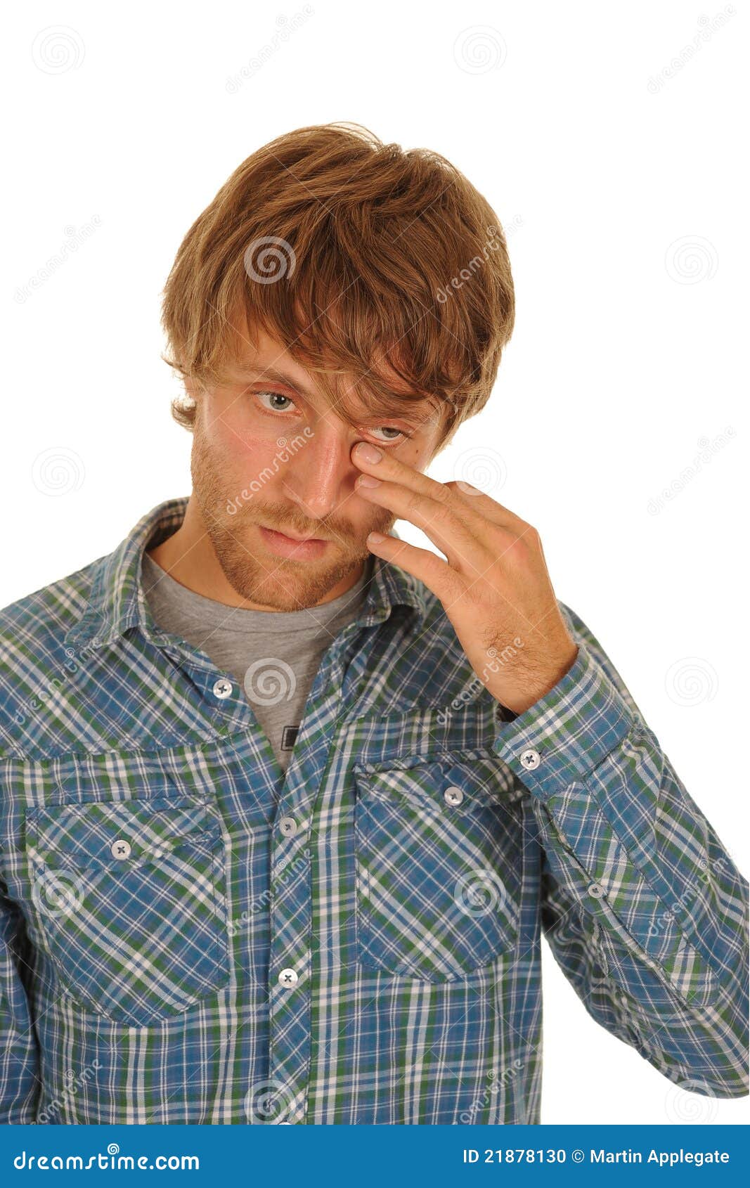 Man wiping tears from eye stock photo. Image of adult - 21878130