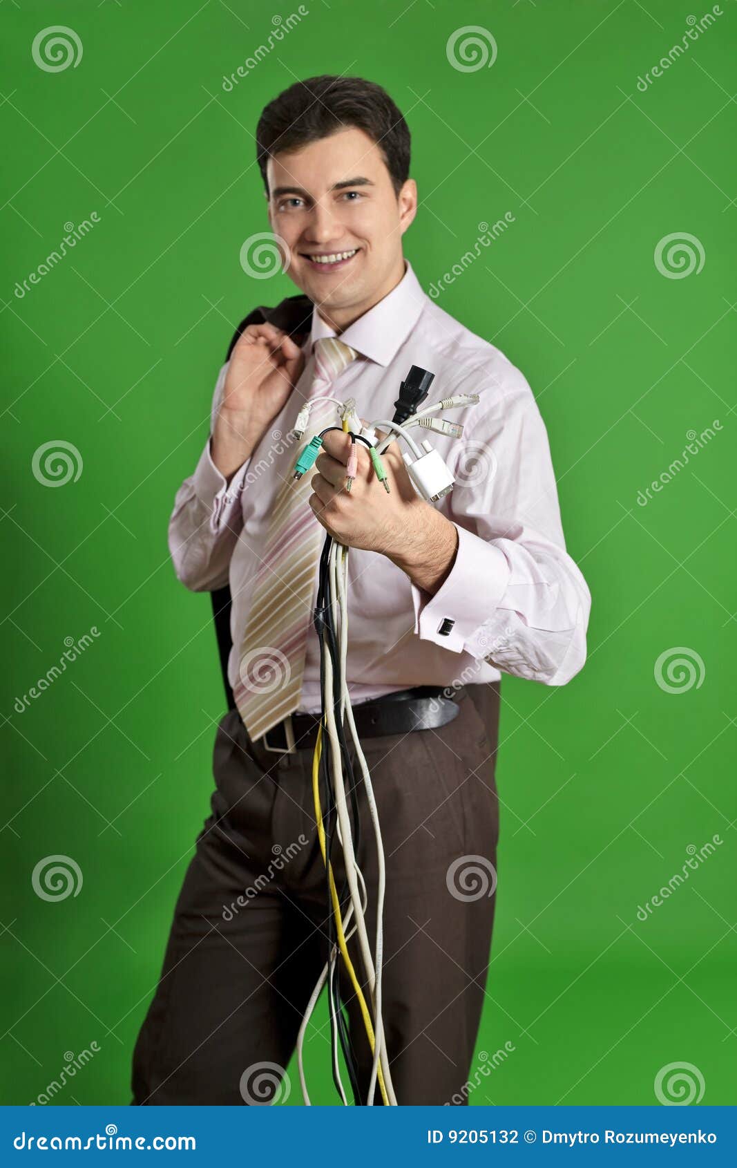 Man with wires in his hand stock photo. Image of green - 9205132