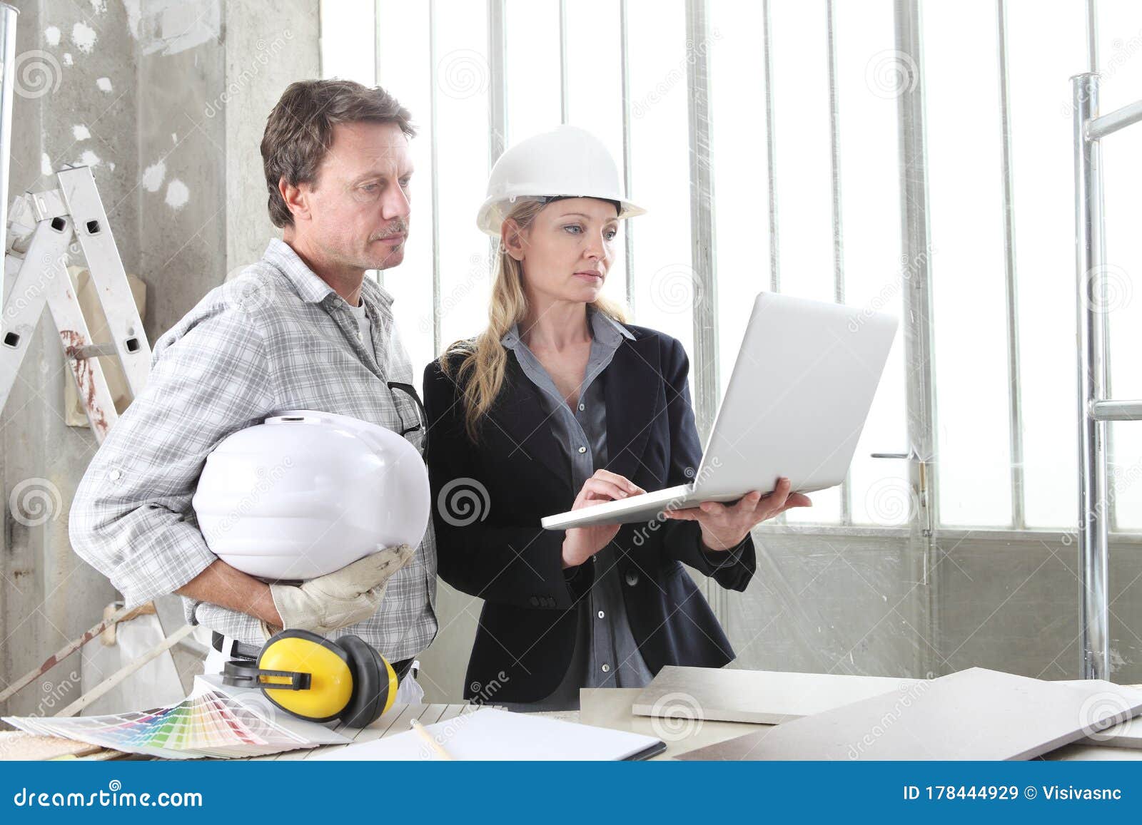 Man and Woman Architect Interior Designer and Foreman Worker Together ...