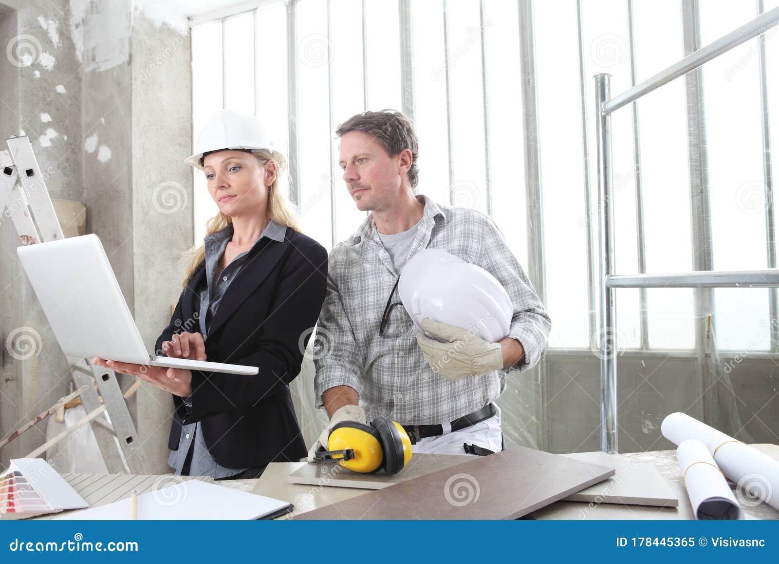 Man and Woman Architect Interior Designer and Foreman Worker Together ...