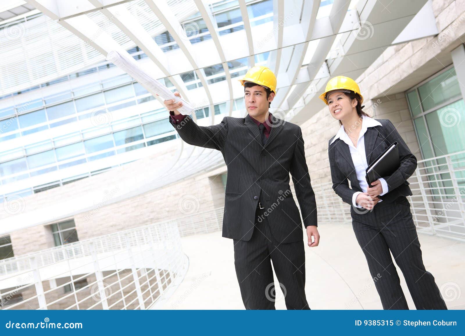 Man And Woman Architects Or Engineers Work Together Discussing With ...