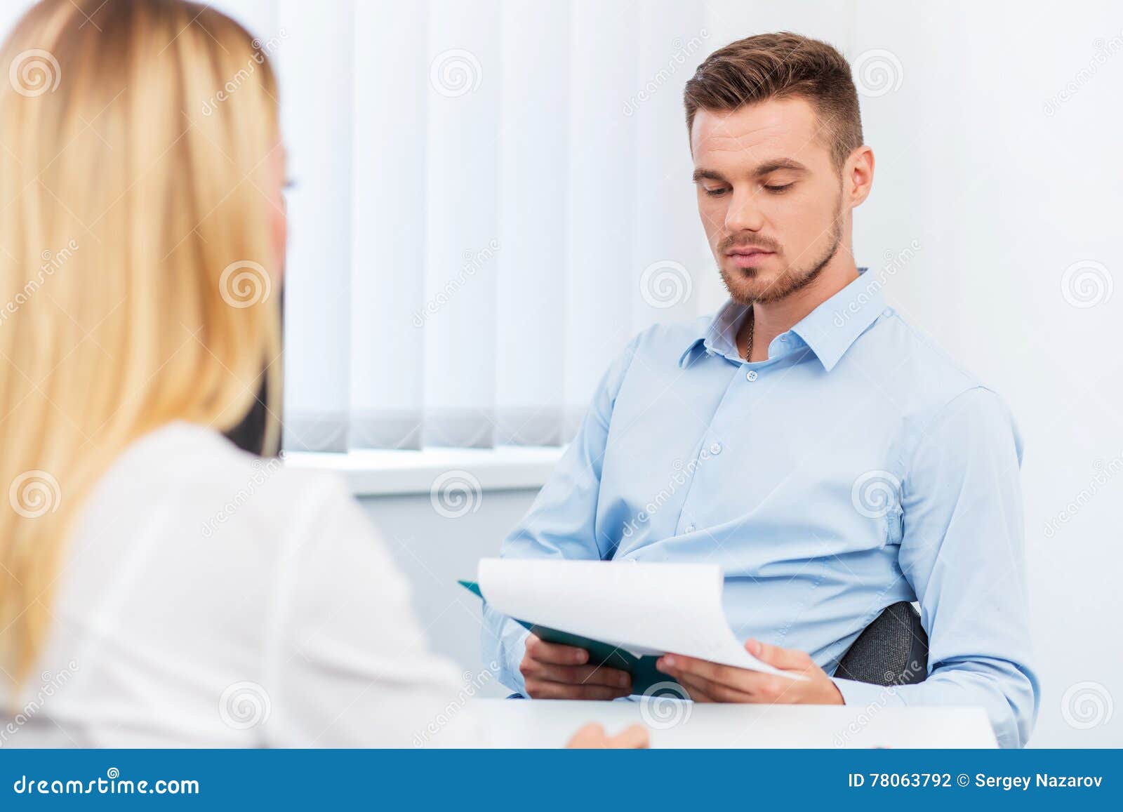 Man and a Woman Being Interviewed in the Office Stock Photo - Image of ...