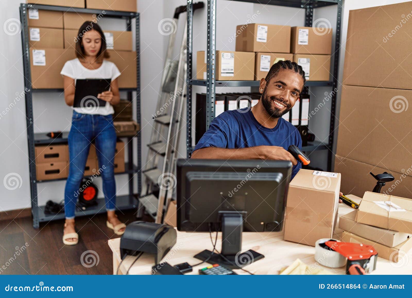 Man and Woman Business Partners Scanning Package Using Barcode Reader ...