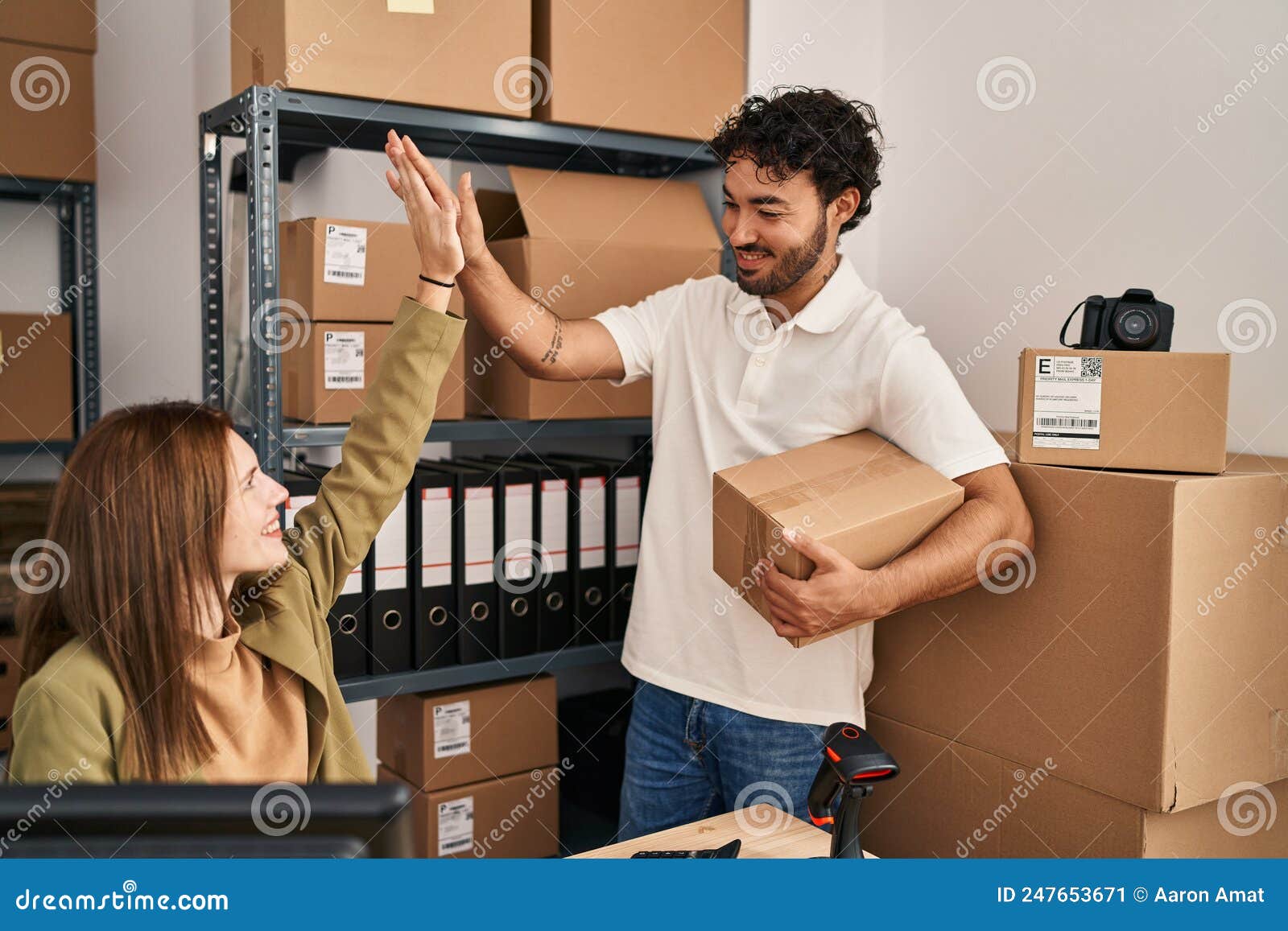 Man and Woman Business Workers High Five with Hands Raised Up at Office ...