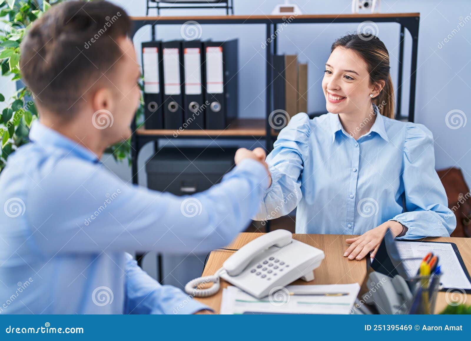 Man and Woman Business Workers Shake Hands Working at Office Stock ...
