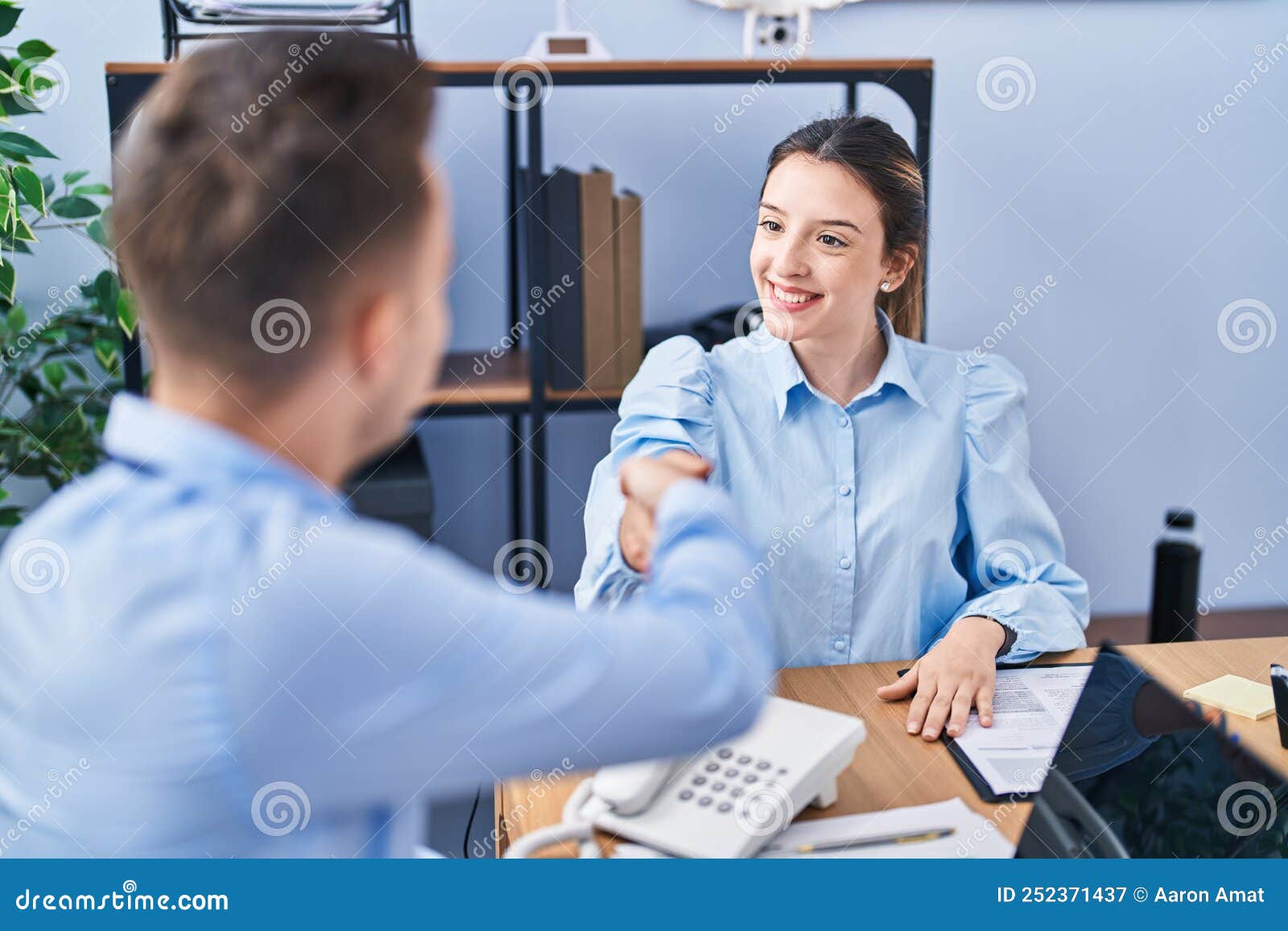 Man and Woman Business Workers Shake Hands Working at Office Stock ...