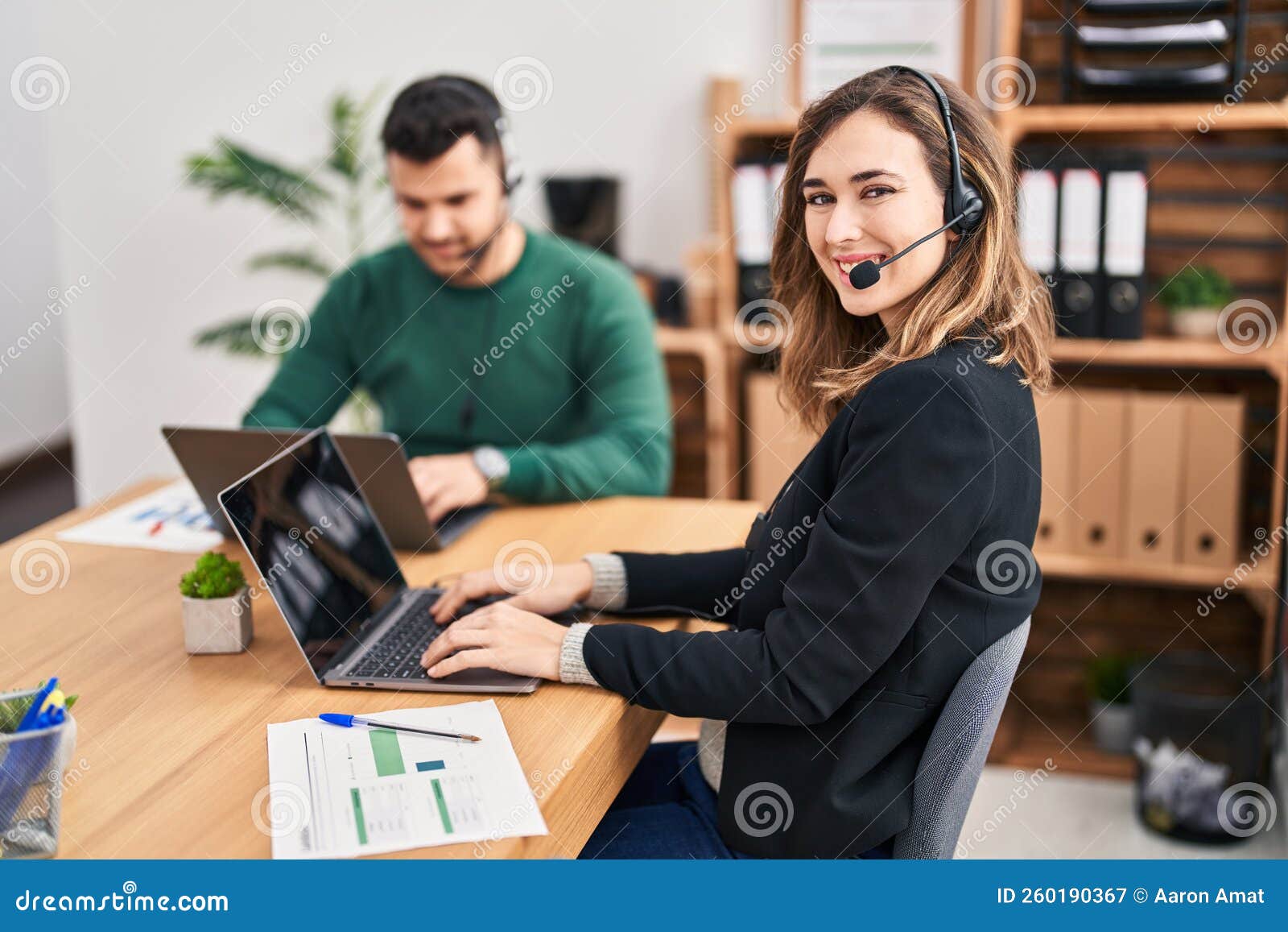 Man and Woman Call Center Agent Using Laptop Working at Office Stock ...