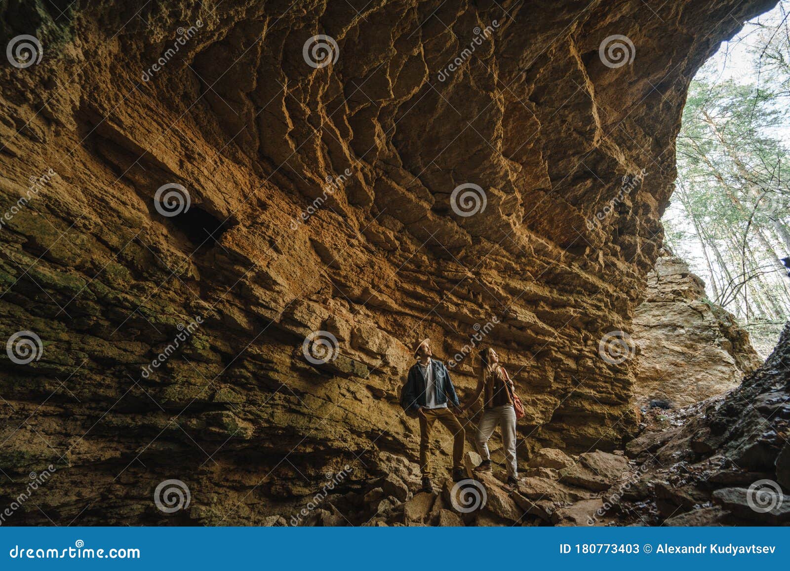 A Man and a Woman in a Cave Stock Image - Image of cave, travel: 180773403