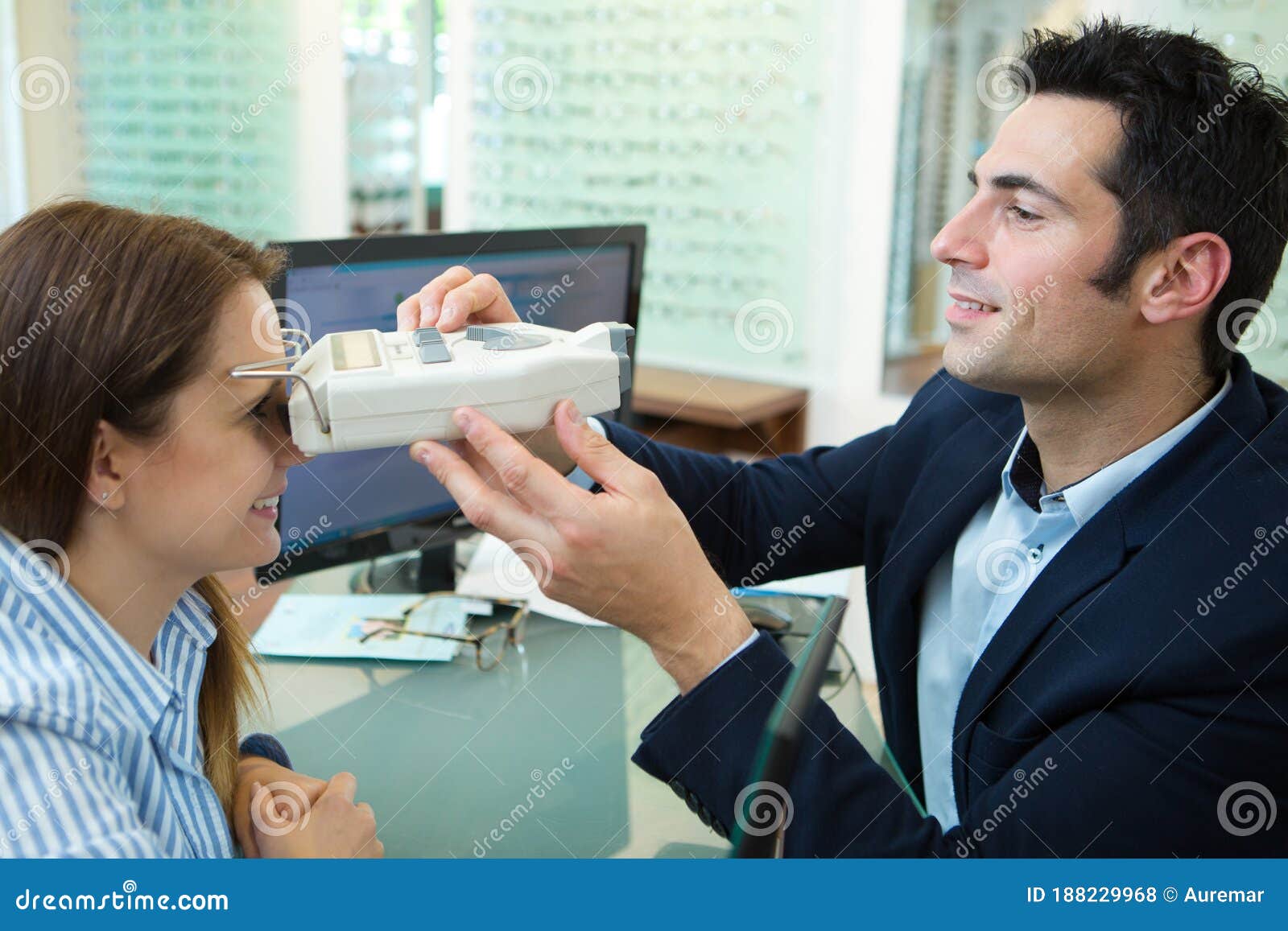 Man and Woman Checking Eyes Correction Stock Photo - Image of eyeglass ...