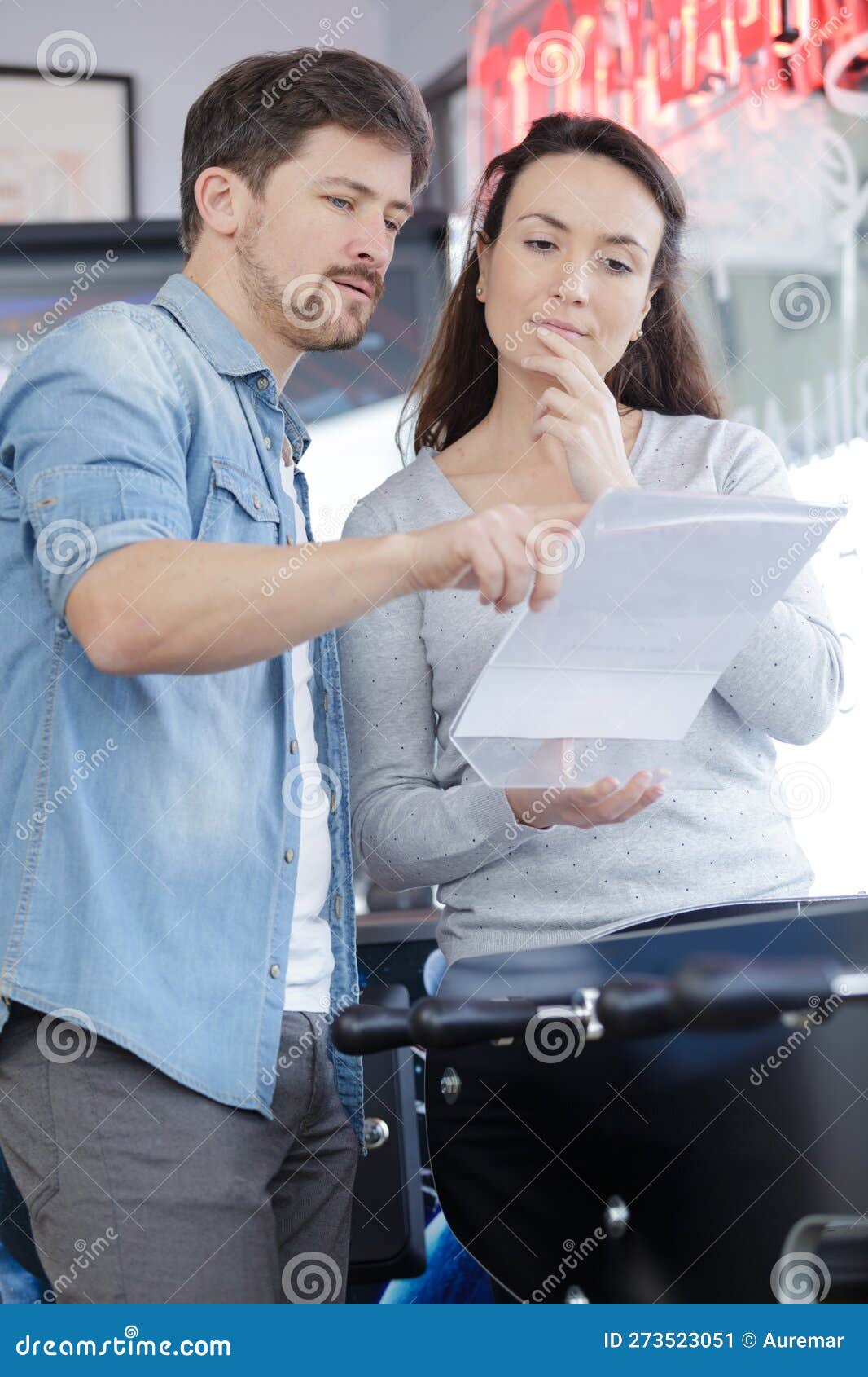 Man and Woman Checking Paperwork Stock Image - Image of woman, drawing ...