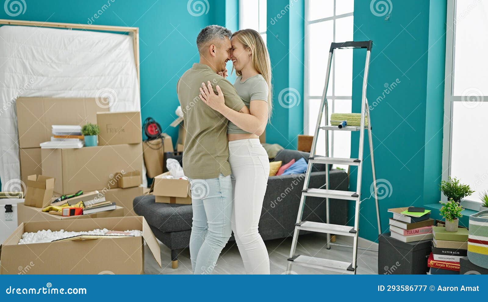 Man And Woman Couple Hugging Each Other Dancing At New Home Stock Image