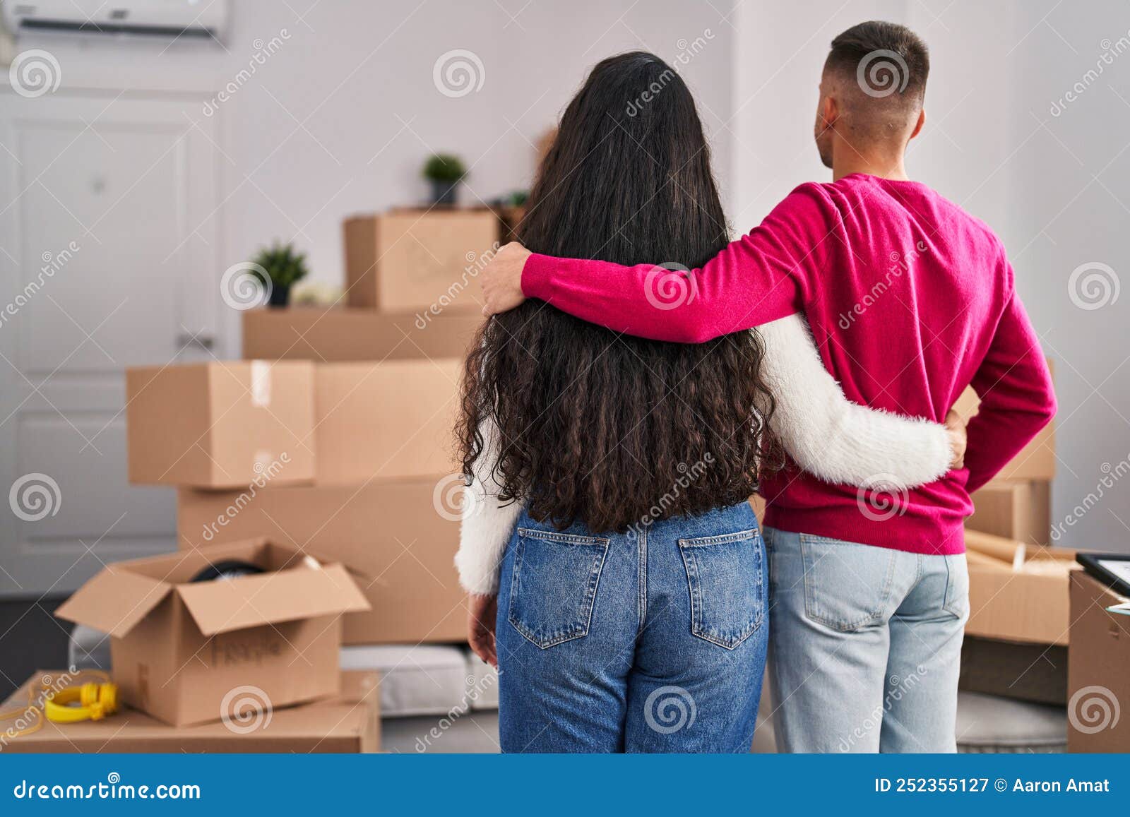 Man And Woman Couple Hugging Each Other Standing On Back View At New