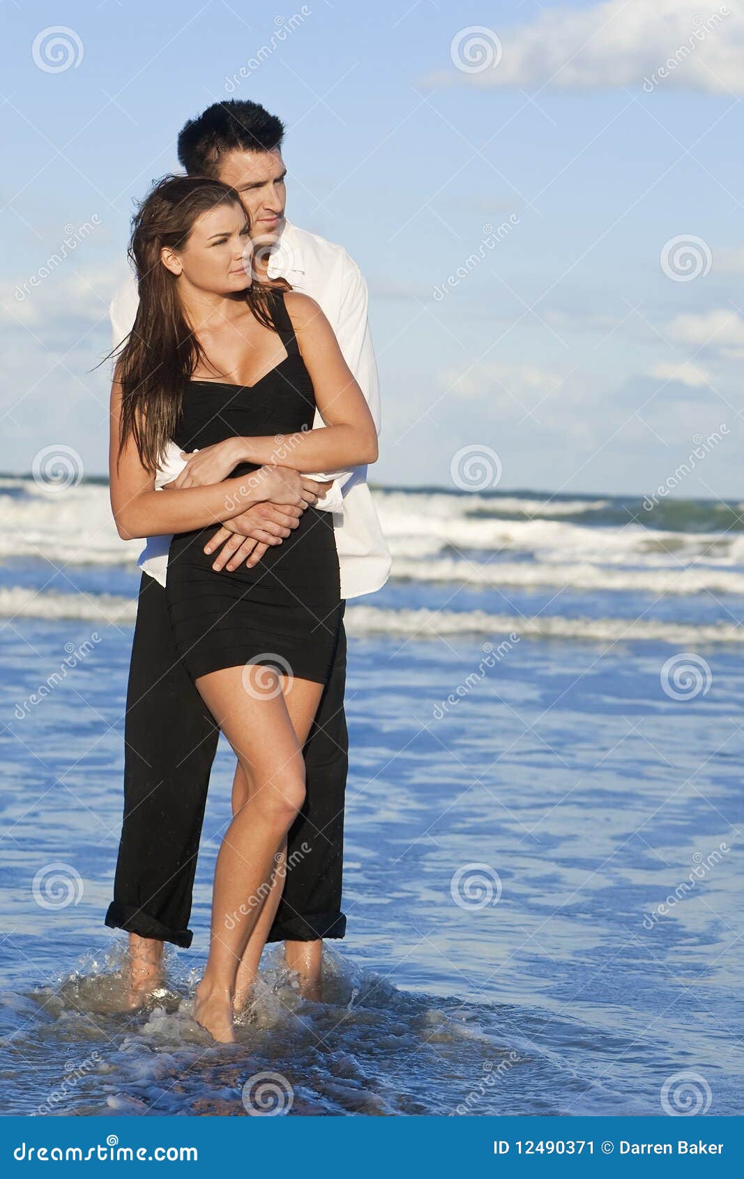 Man And Woman Couple In Romantic Embrace On Beach Stock Image Image