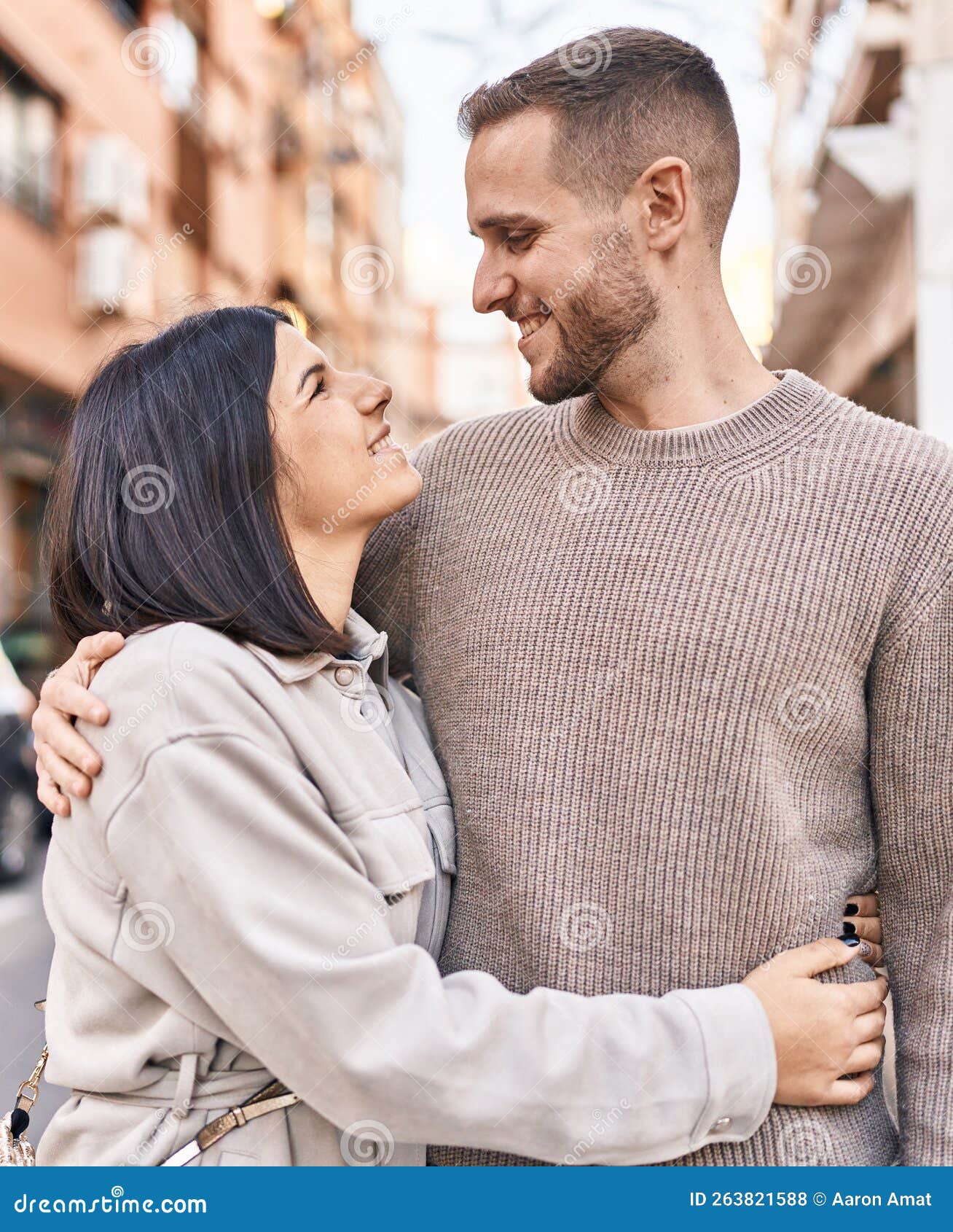 Man And Woman Couple Smiling Confident Hugging Each Other Standing At