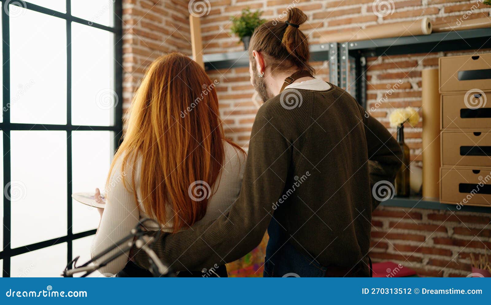 Man and Woman Couple Standing on Back View at Art Studio Stock Photo ...