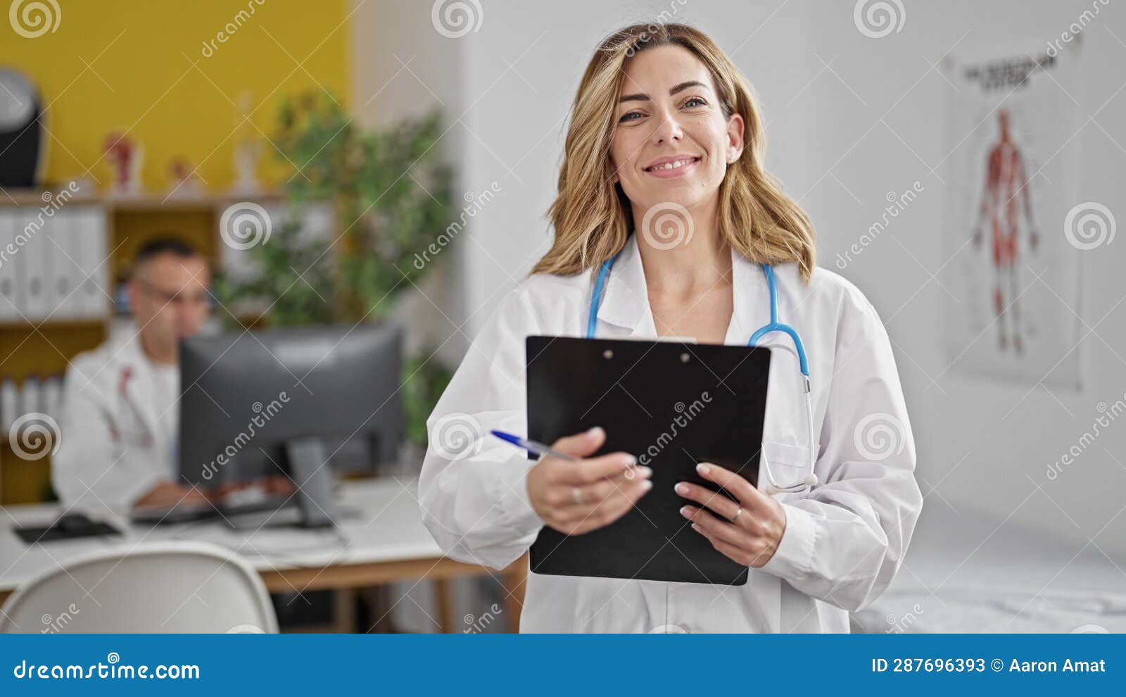 Man and Woman Doctors Writing Medical Report Using Computer Working at the Clinic Stock Video ...