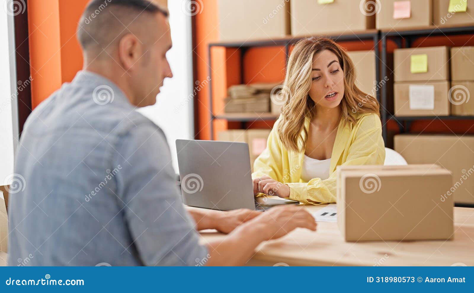 Man and Woman Ecommerce Business Worker and Client Speaking at Office ...