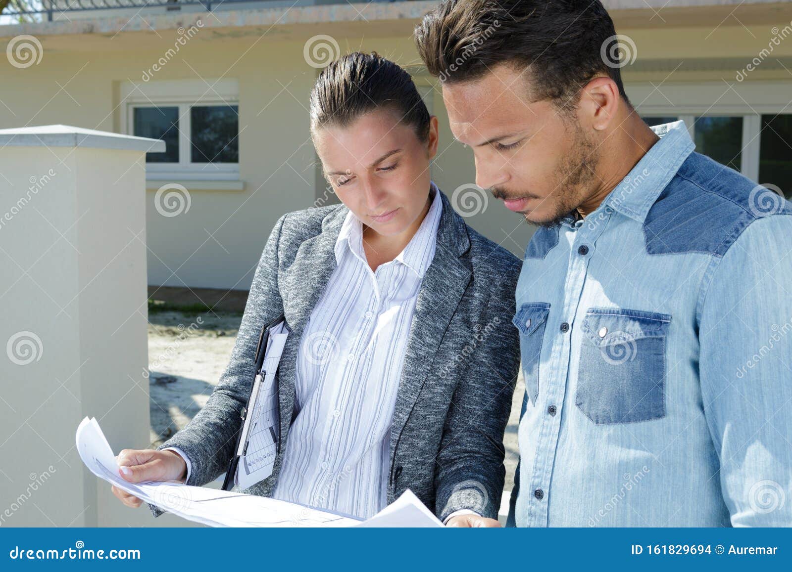Man and Woman Engineers Work on Plans Construction Stock Photo - Image ...