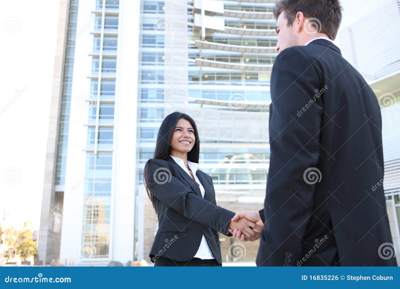 Man and Woman Handshake stock photo. Image of caucasian - 16835226