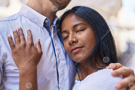 Man And Woman Interracial Couple Hugging Each Other At Street Stock